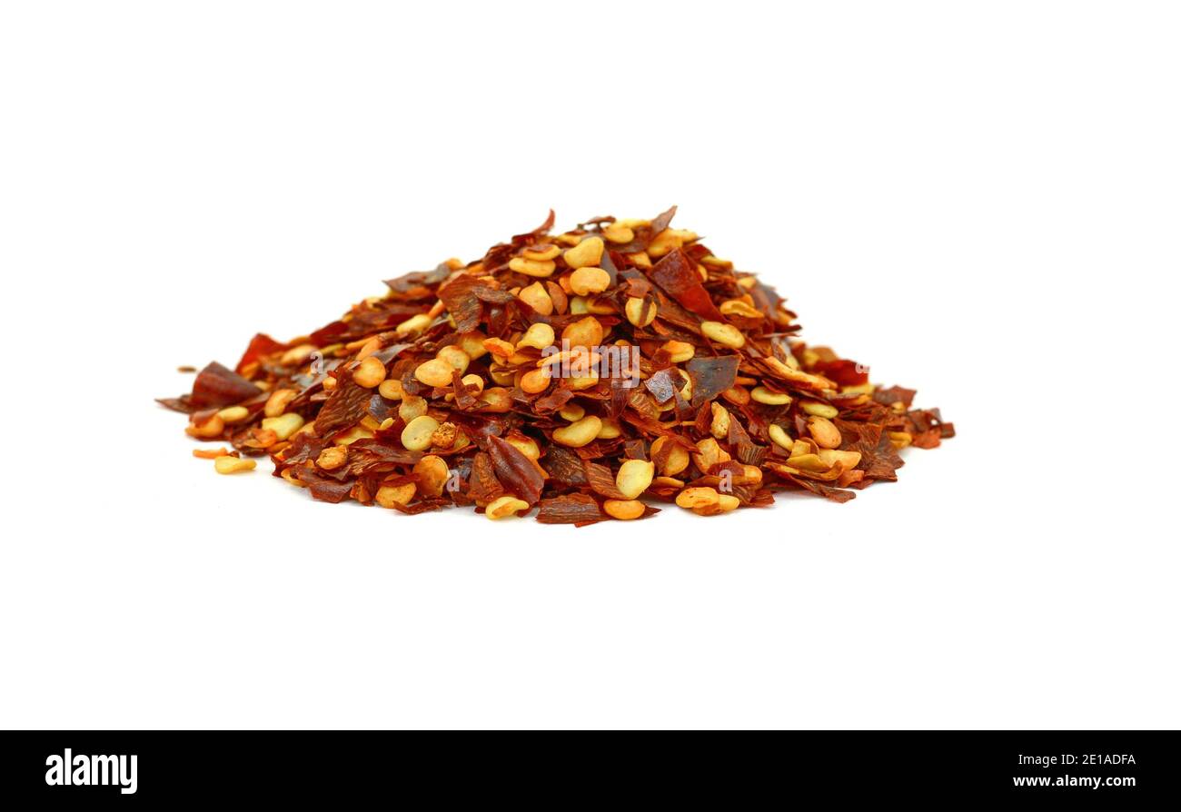 Cayenne pepper. Pile crushed red cayenne pepper, dried chili flakes and ...