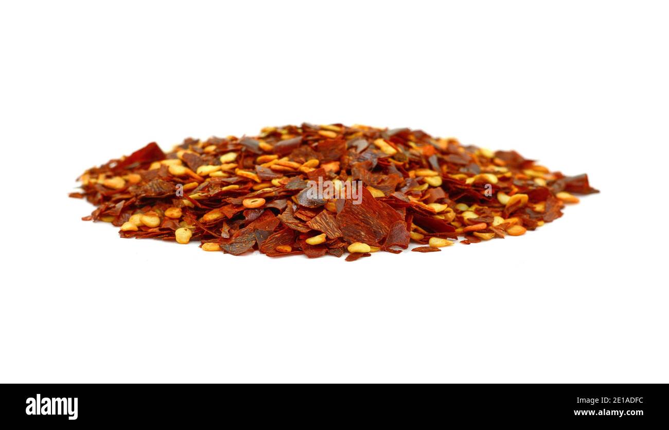 Cayenne pepper. Pile crushed red cayenne pepper, dried chili flakes and ...