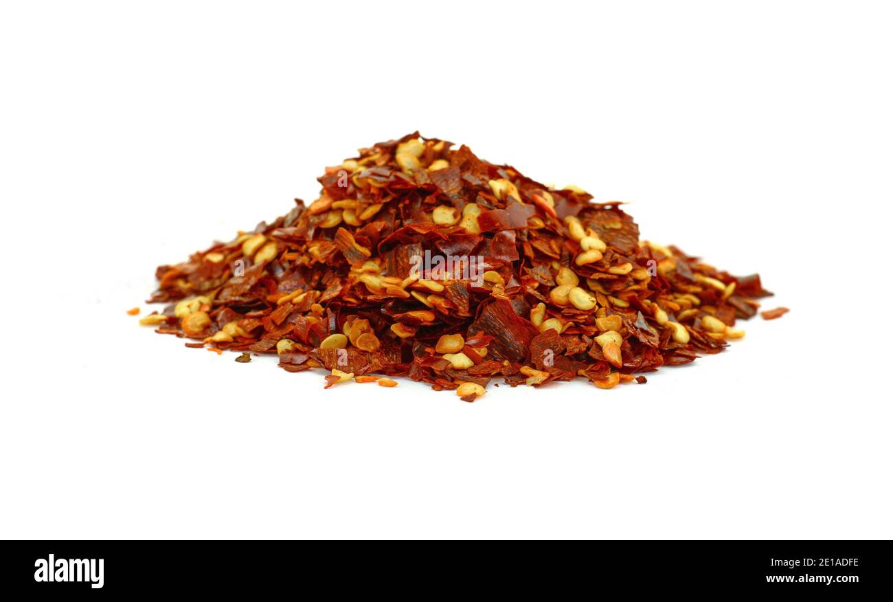 Cayenne pepper. Pile crushed red cayenne pepper, dried chili flakes and ...