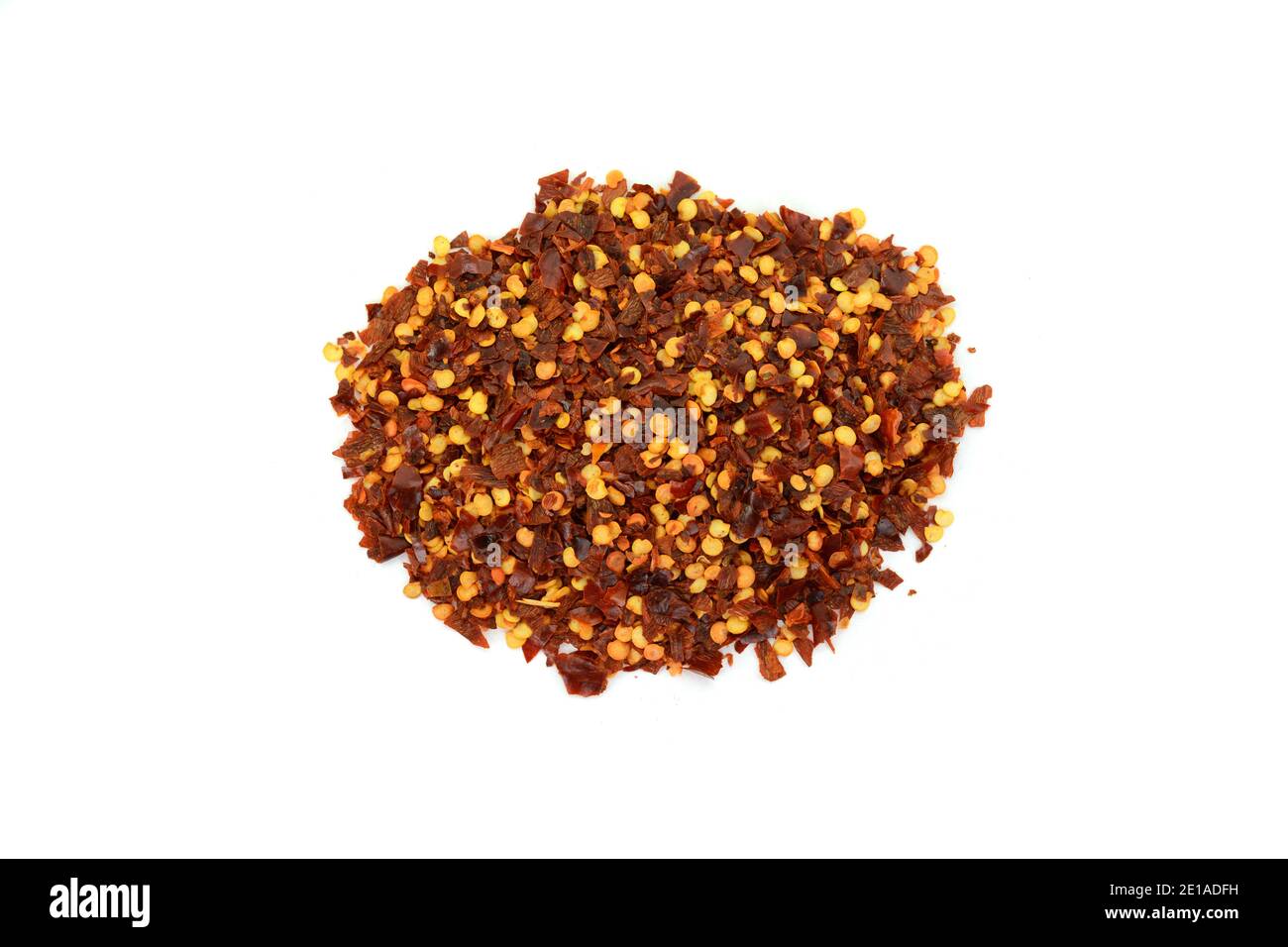 Cayenne pepper. Pile crushed red cayenne pepper, dried chili flakes and ...