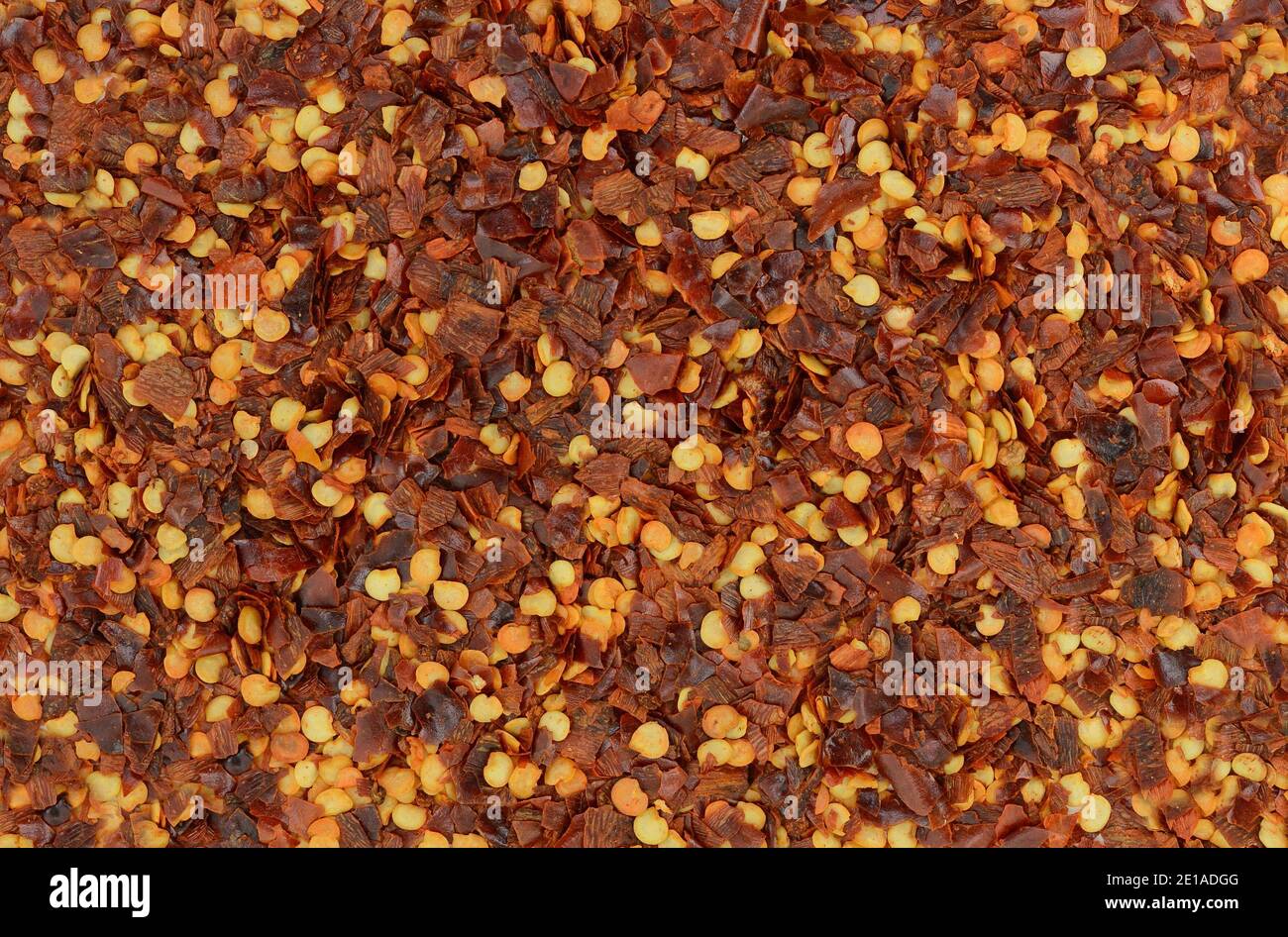 Cayenne pepper. Pile crushed red cayenne pepper, dried chili flakes and ...