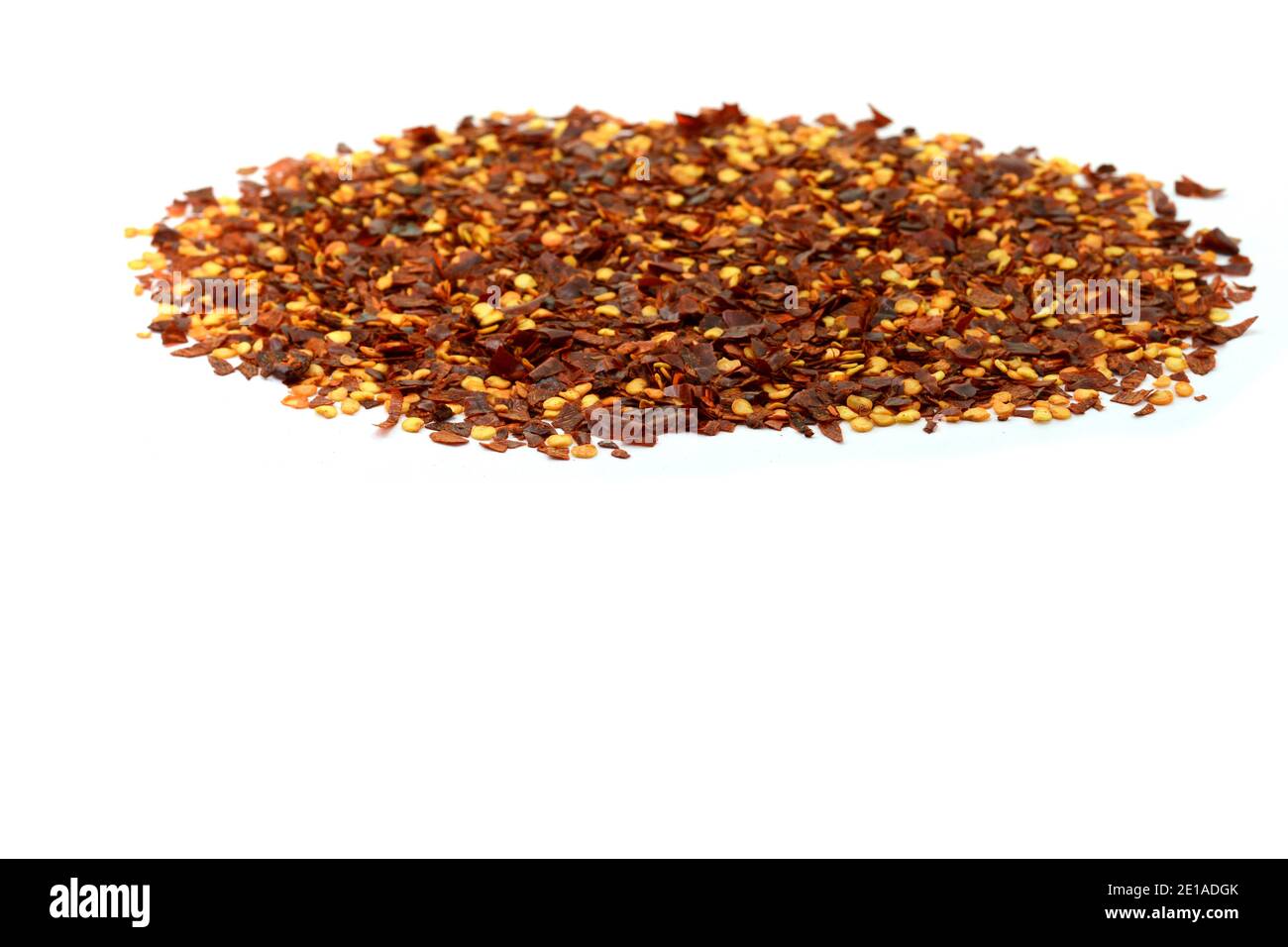 Cayenne pepper. Pile crushed red cayenne pepper, dried chili flakes and ...