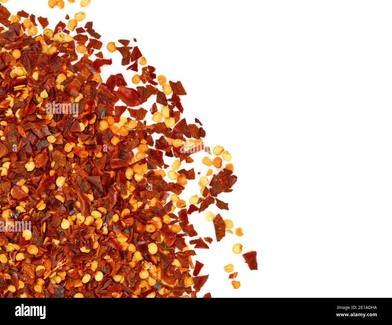 Cayenne pepper. Pile crushed red cayenne pepper, dried chili flakes and ...
