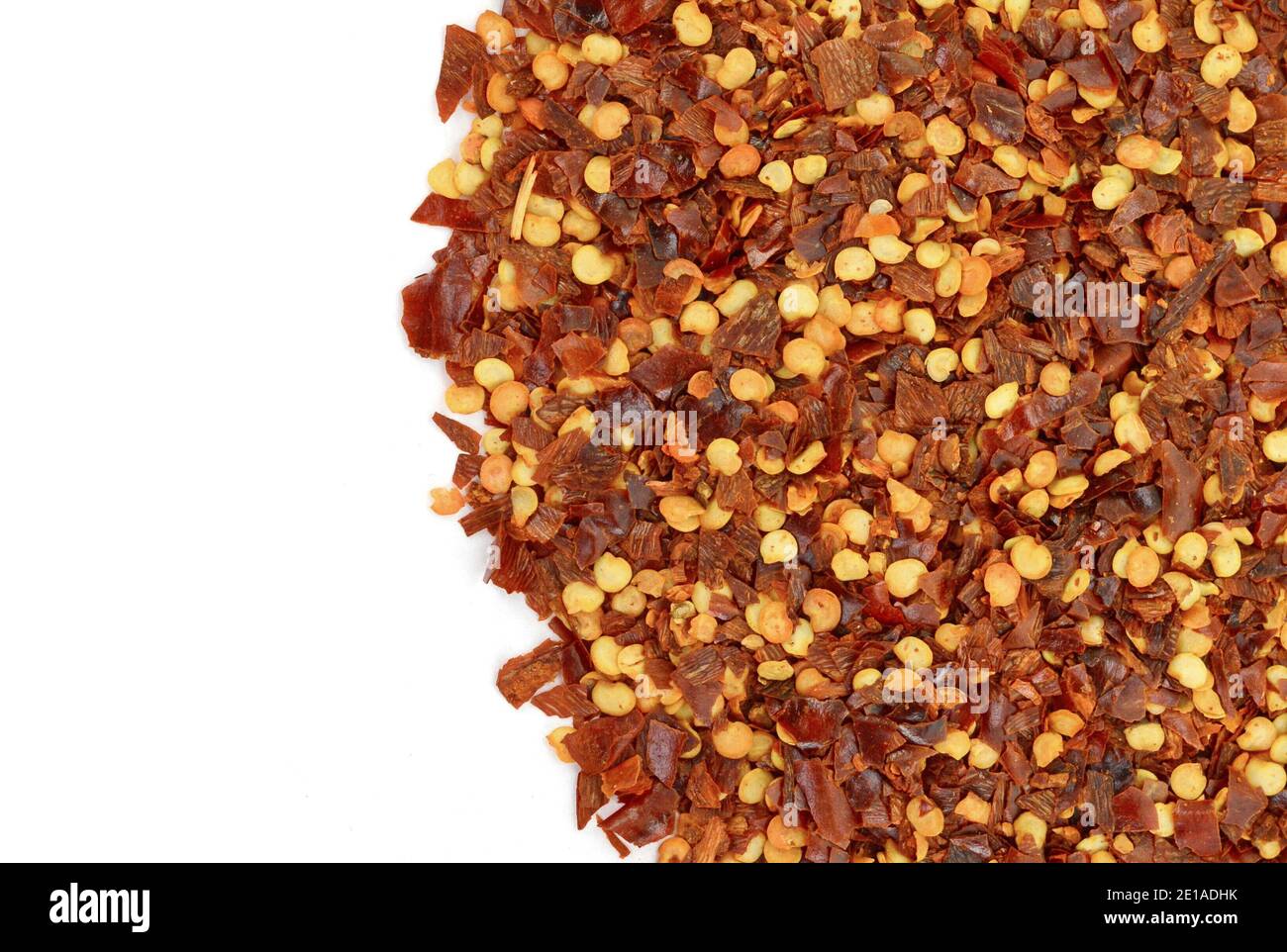 Cayenne pepper. Pile crushed red cayenne pepper, dried chili flakes and ...