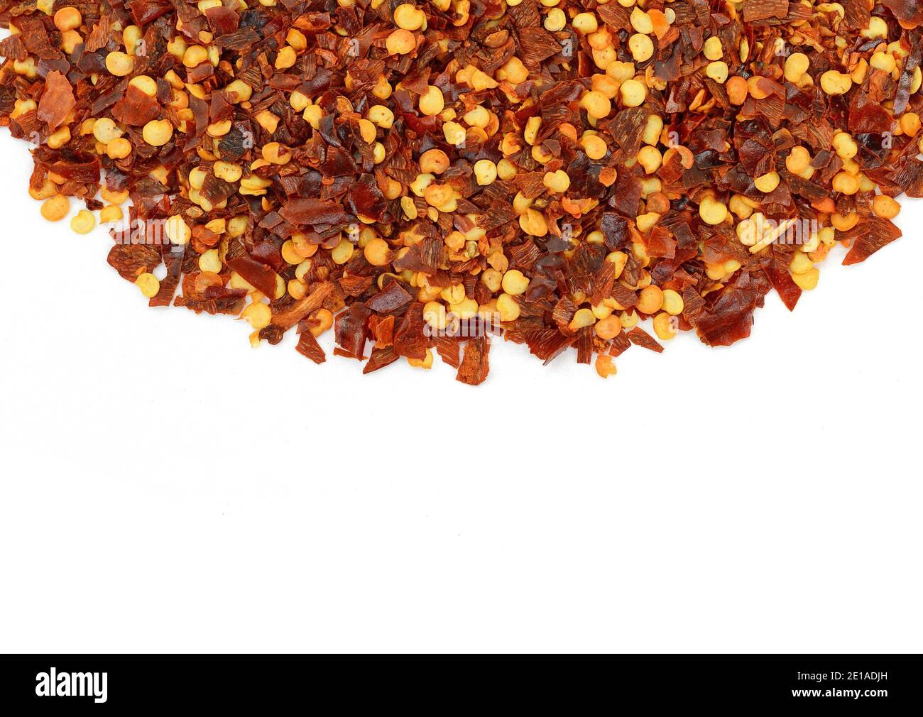 Cayenne pepper. Pile crushed red cayenne pepper, dried chili flakes and ...