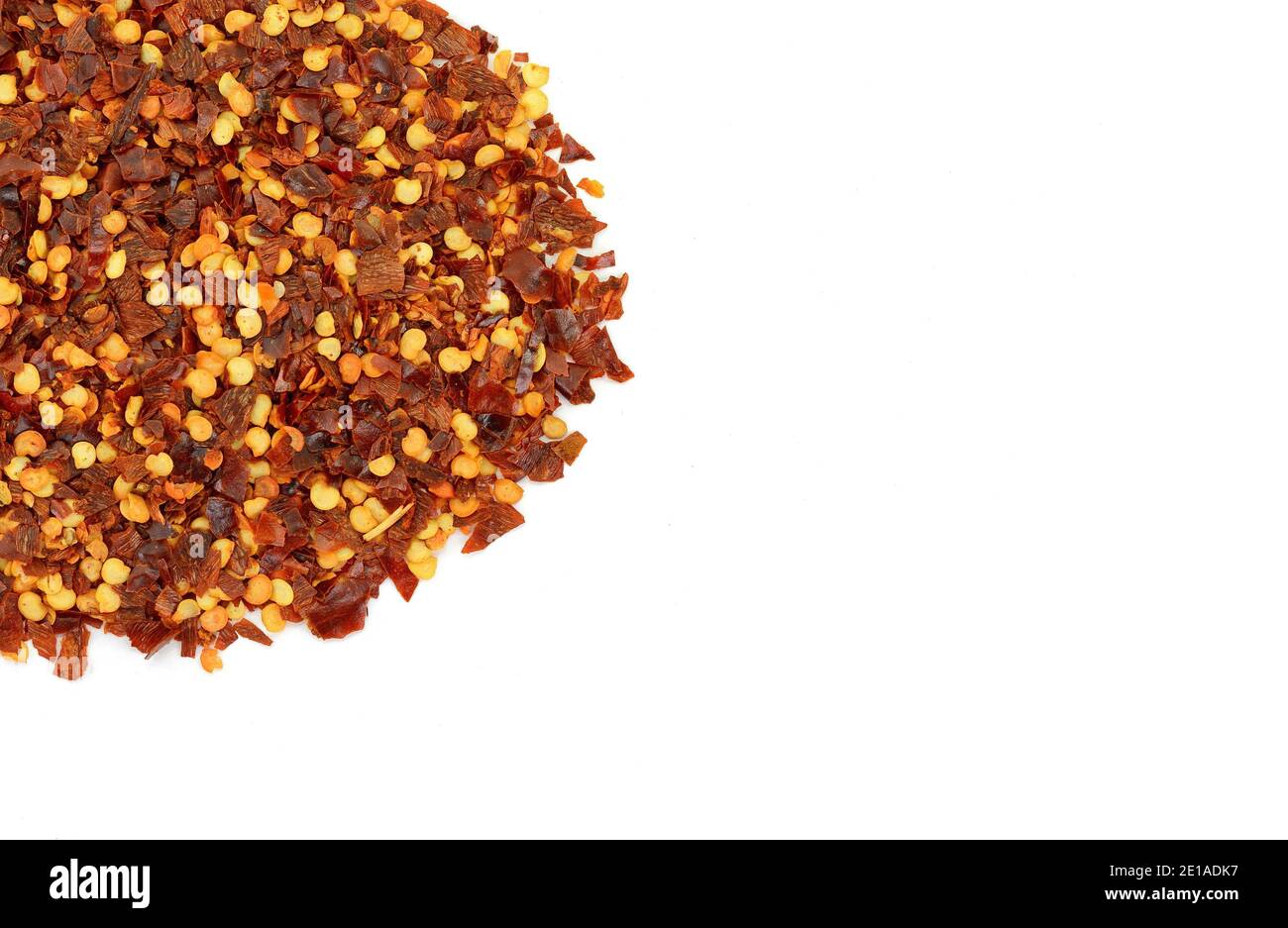 Cayenne pepper. Pile crushed red cayenne pepper, dried chili flakes and ...