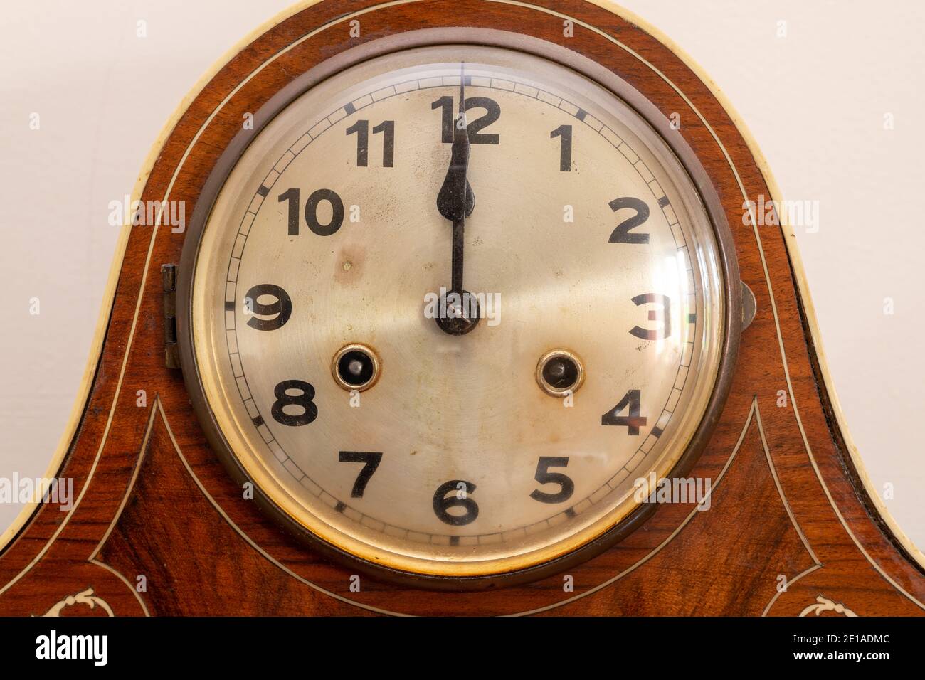 Close up of an antique clock showing 12 oclock Stock Photo - Alamy