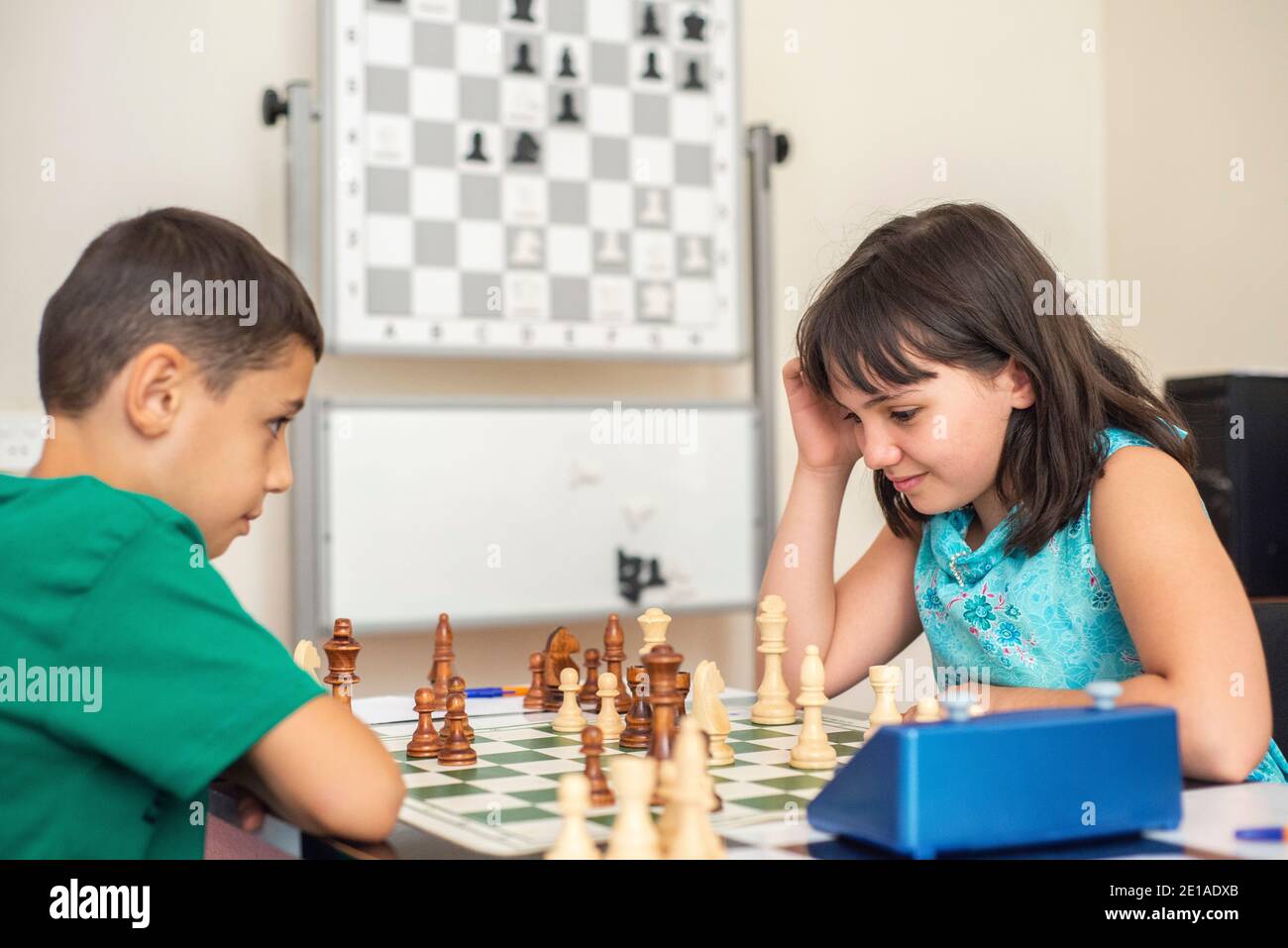 Learners of the Quba Chess School play chess during a training lesson ...