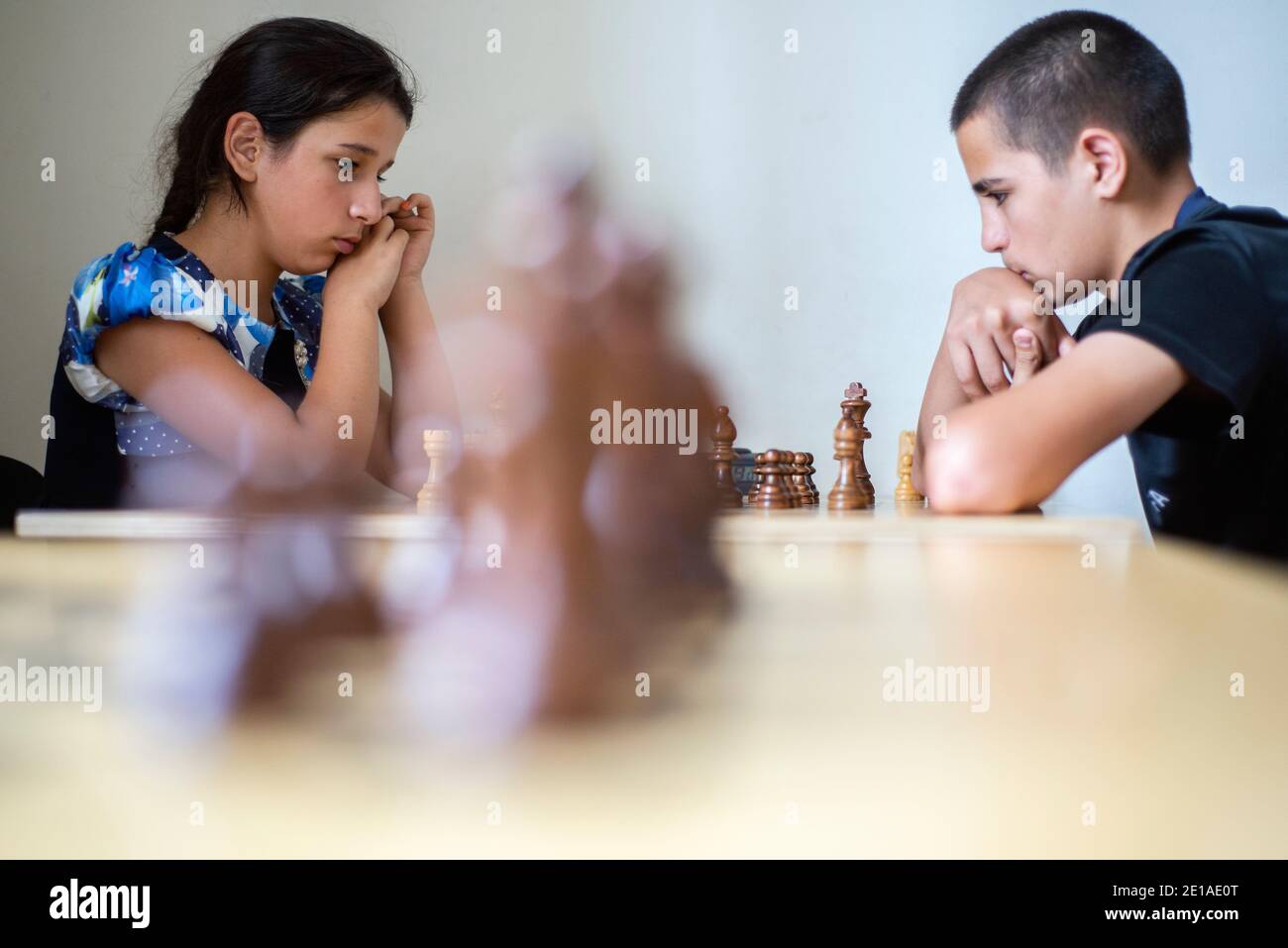 Children playing chess in classroom hi-res stock photography and images ...