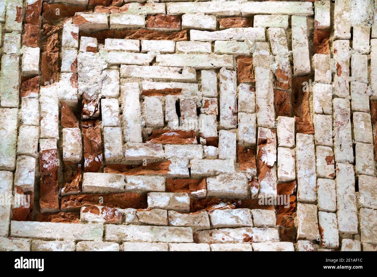 Old masonry wall of red bricks in the shape of a square Stock Photo - Alamy