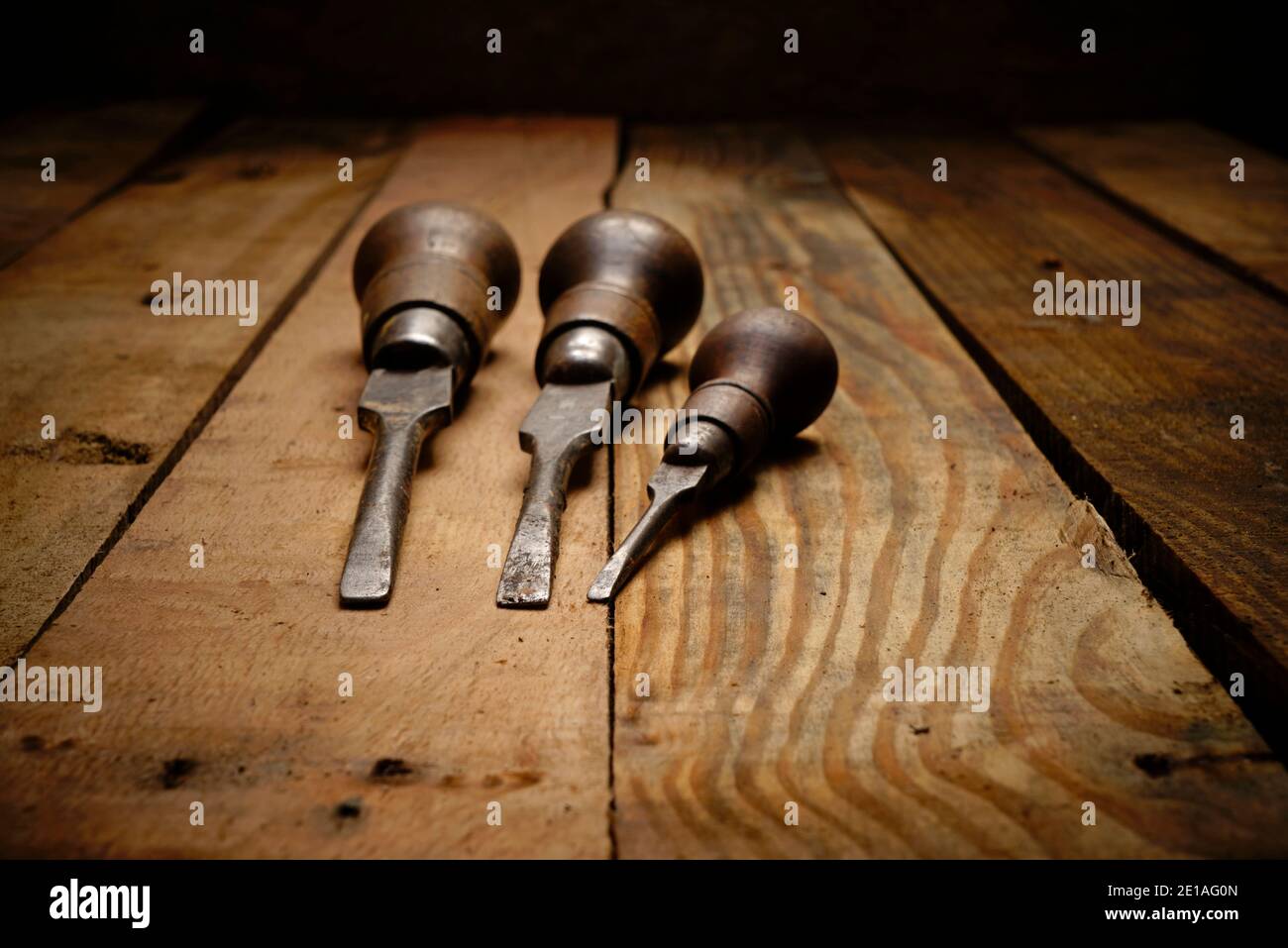 Three vintage wooden handled screwdrivers on planks of wood Stock Photo ...