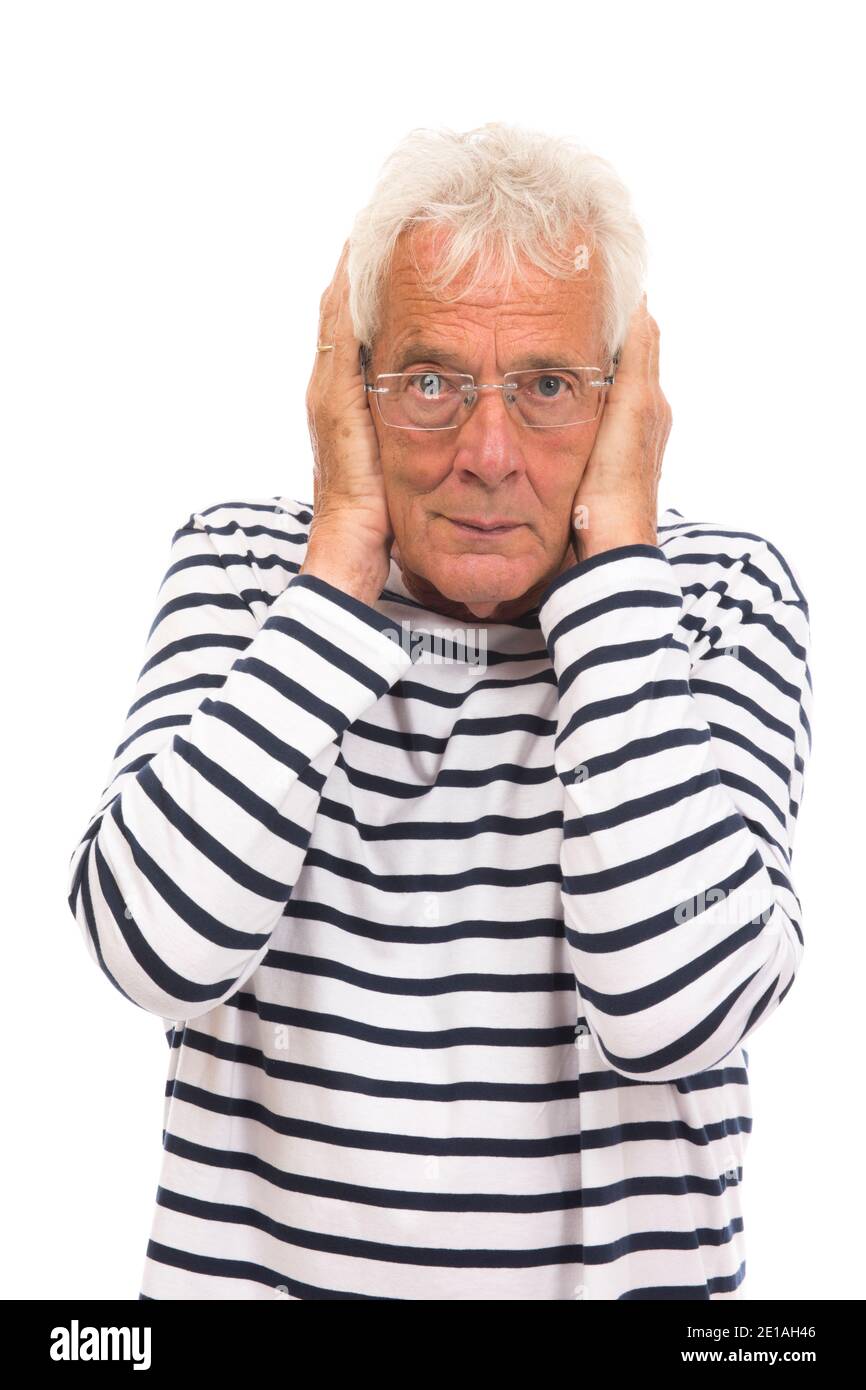 Senior man with too much noise isolated over white background Stock ...