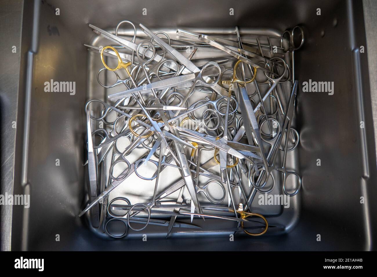 in the sterilization department in an operating room, instruments are ...