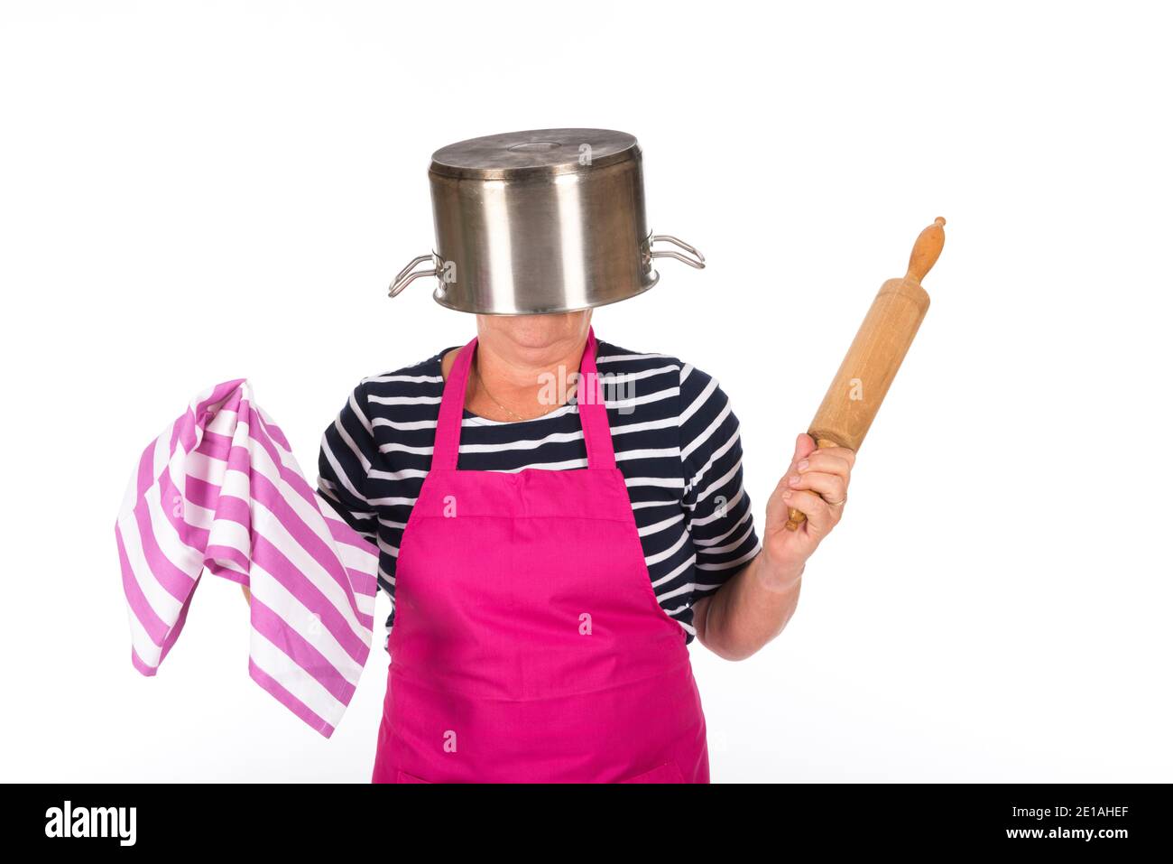 Funny elder woman with pan on the head isolated over white background ...