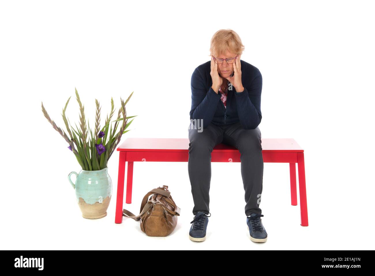 Sad senior woman is waiting isolated over white background Stock Photo ...