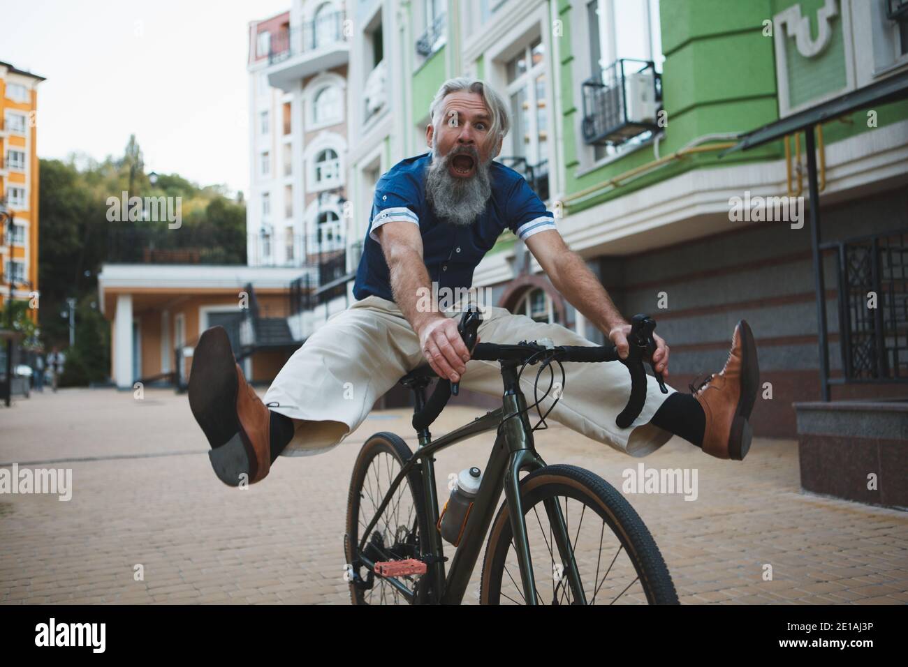 Funny cycling vintage hi-res stock photography and images - Alamy