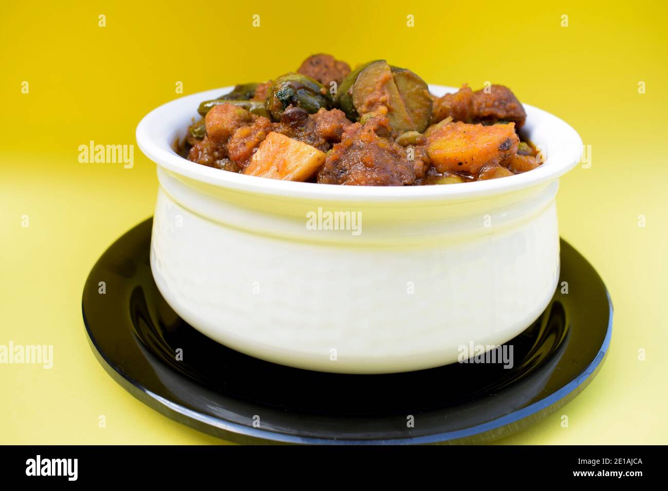 Delicious authentic traditional gujarati dish called Undhiyu cooked ...