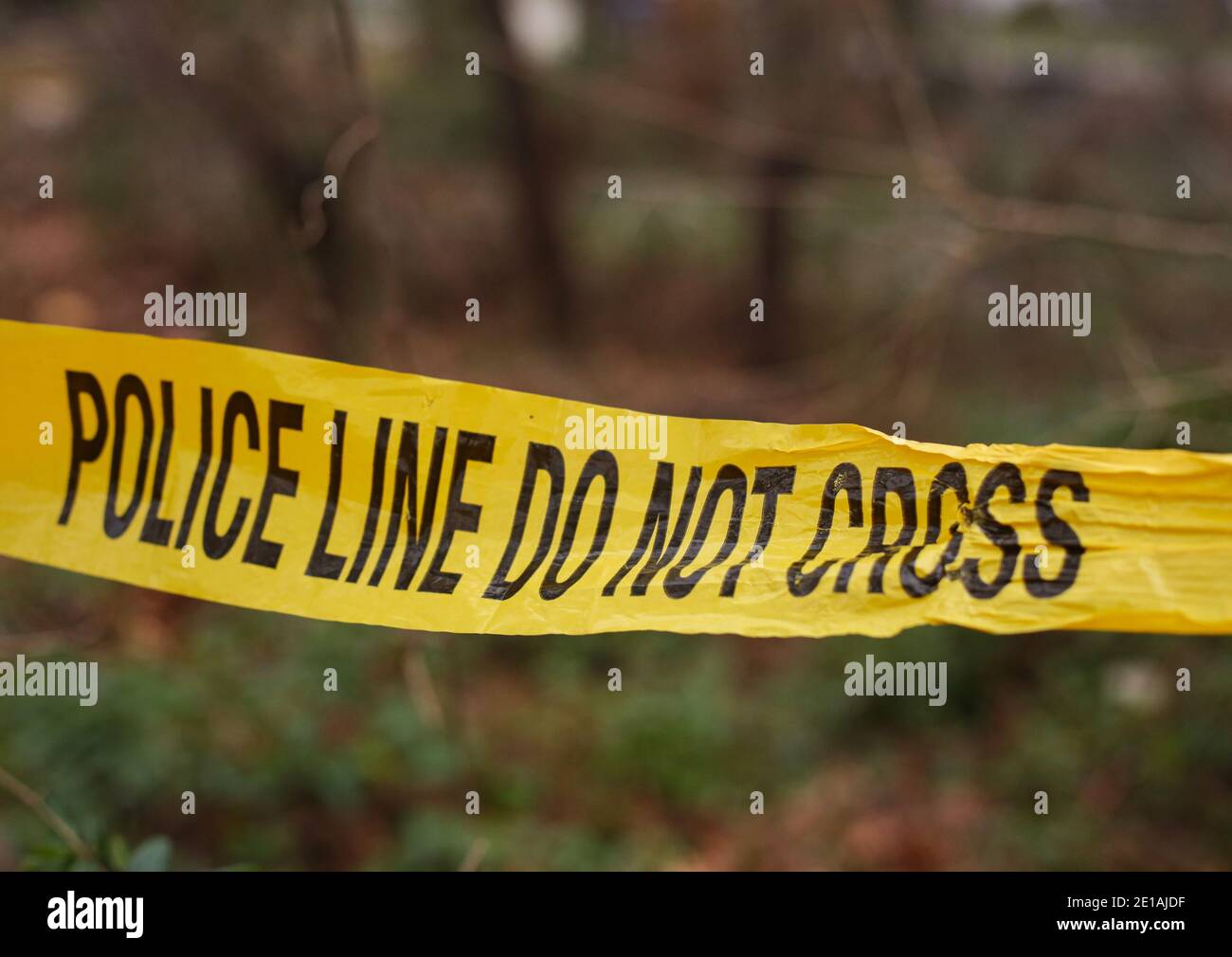 Police line , caution do not enter area Stock Photo - Alamy