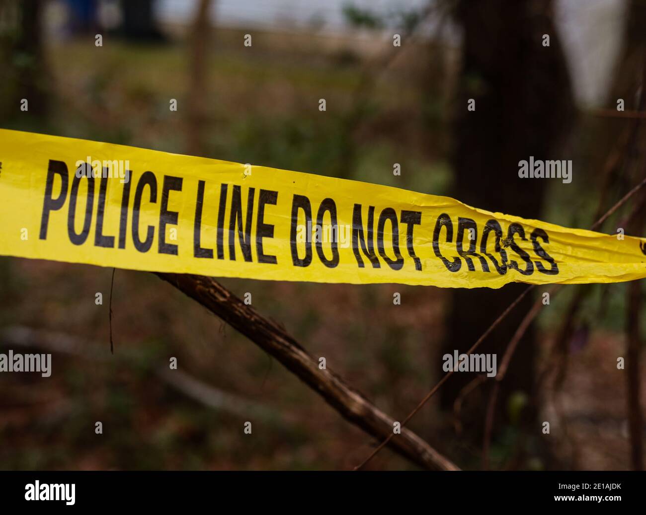 Police line , caution do not enter area Stock Photo - Alamy