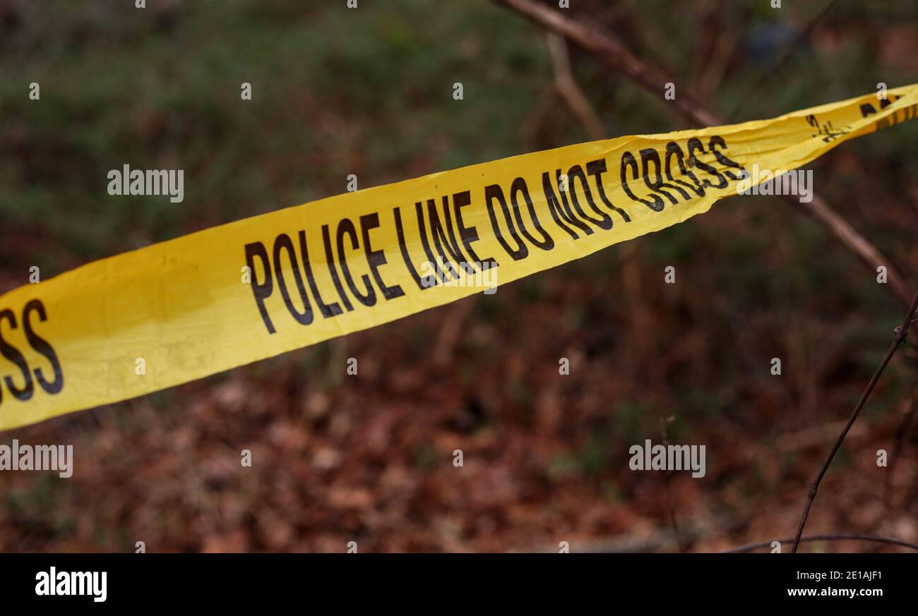 Police line , caution do not enter area Stock Photo - Alamy