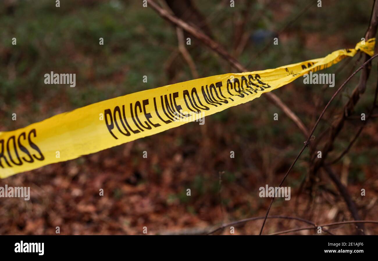 Police line , caution do not enter area Stock Photo - Alamy