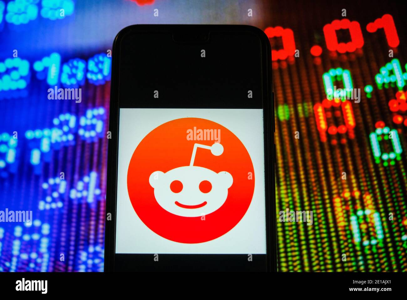 In this photo illustration, a Reddit logo seen displayed on a ...