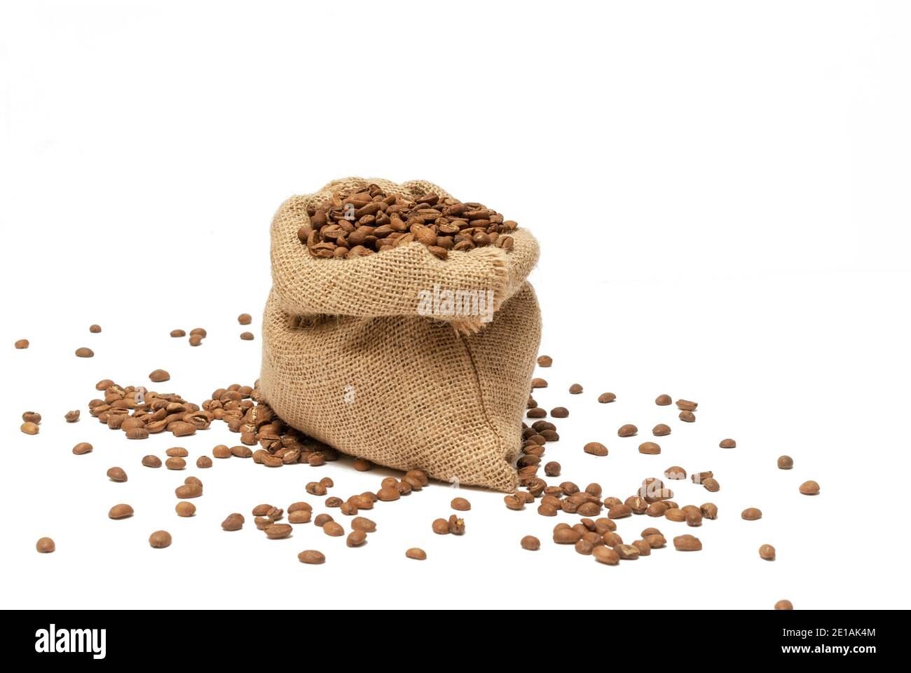 Jute bag full of roasted coffee beans, on white background Stock Photo ...