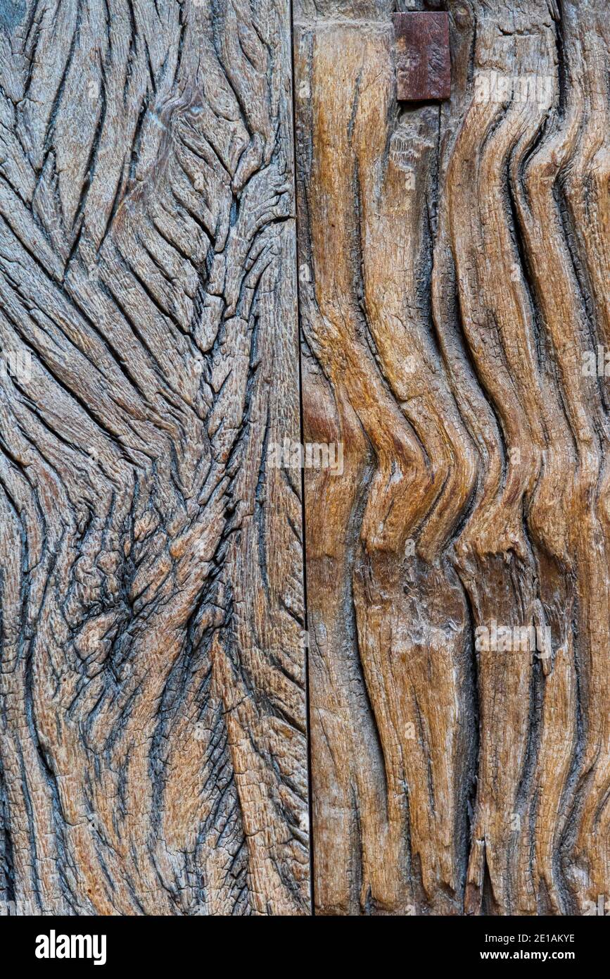 Textured natural wood background with golden highlighted grooves ...