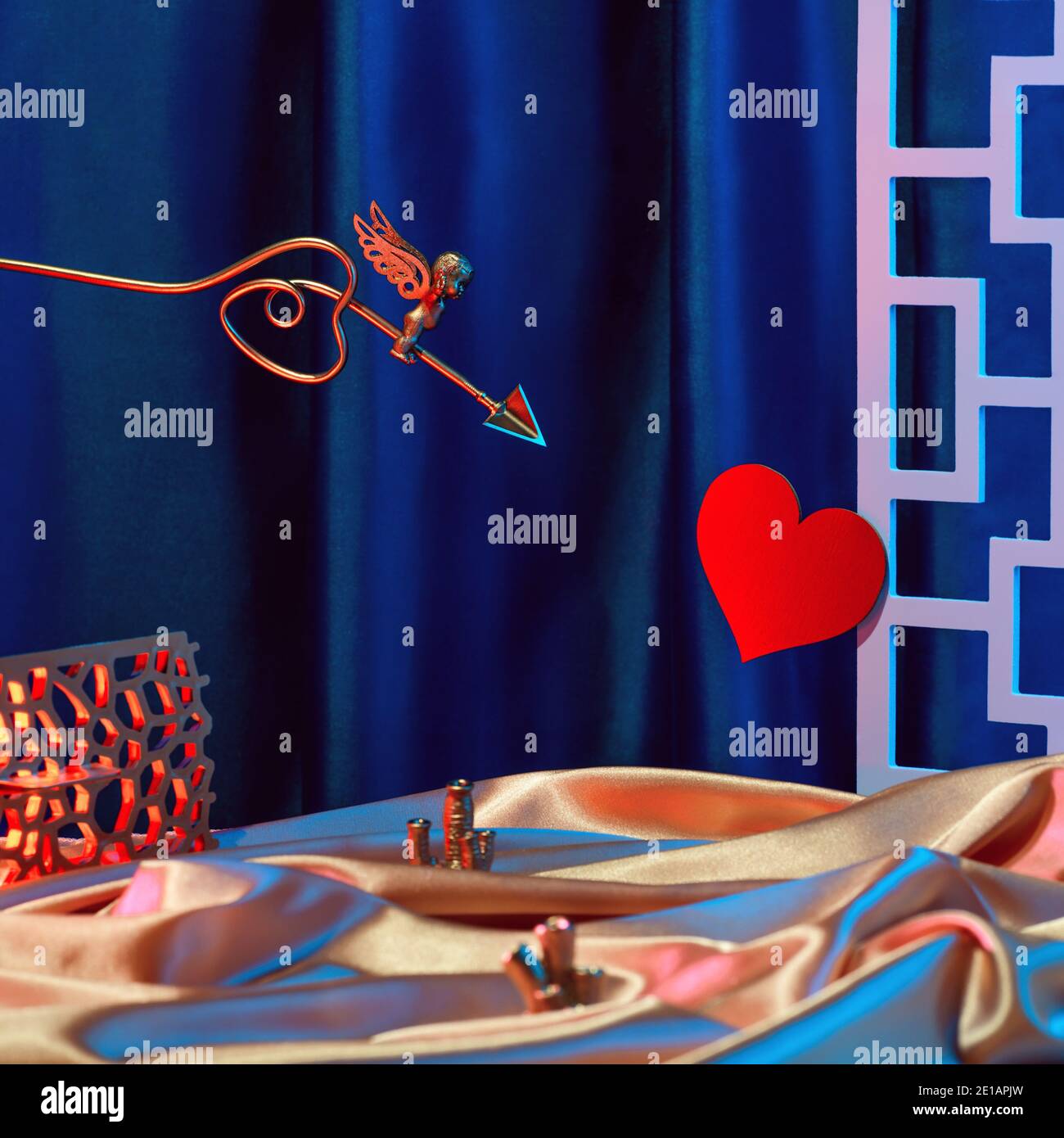 Small golden cupid marks his target with an arrow at the heart ...