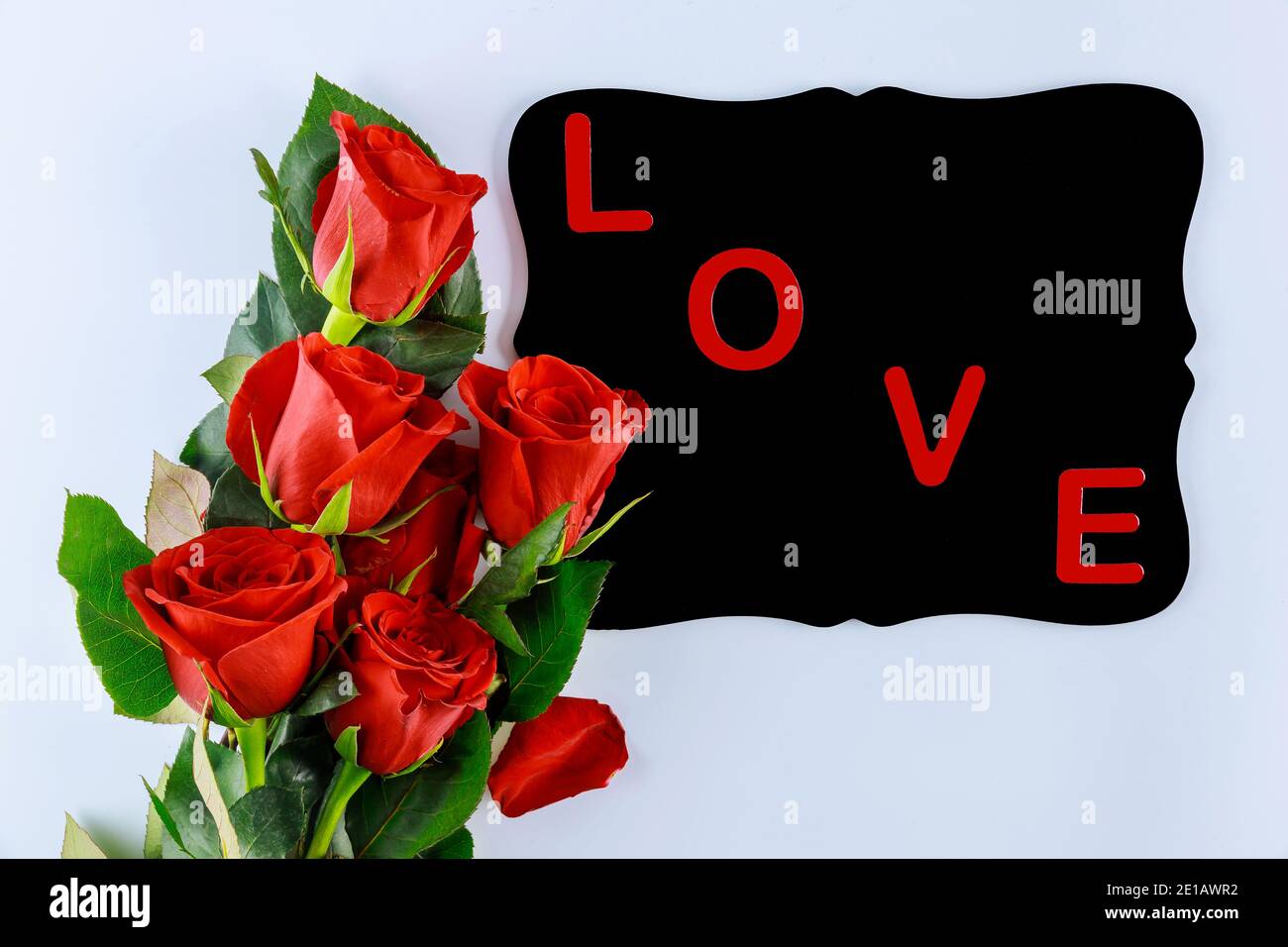 Red roses black board hi-res stock photography and images - Alamy