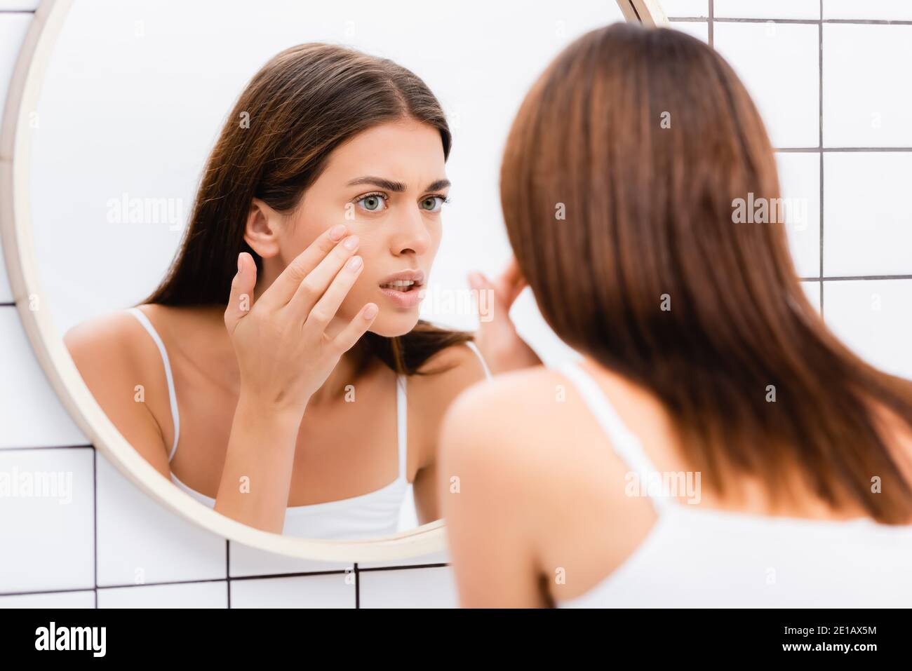 Woman face mirror unhappy hi-res stock photography and images - Alamy