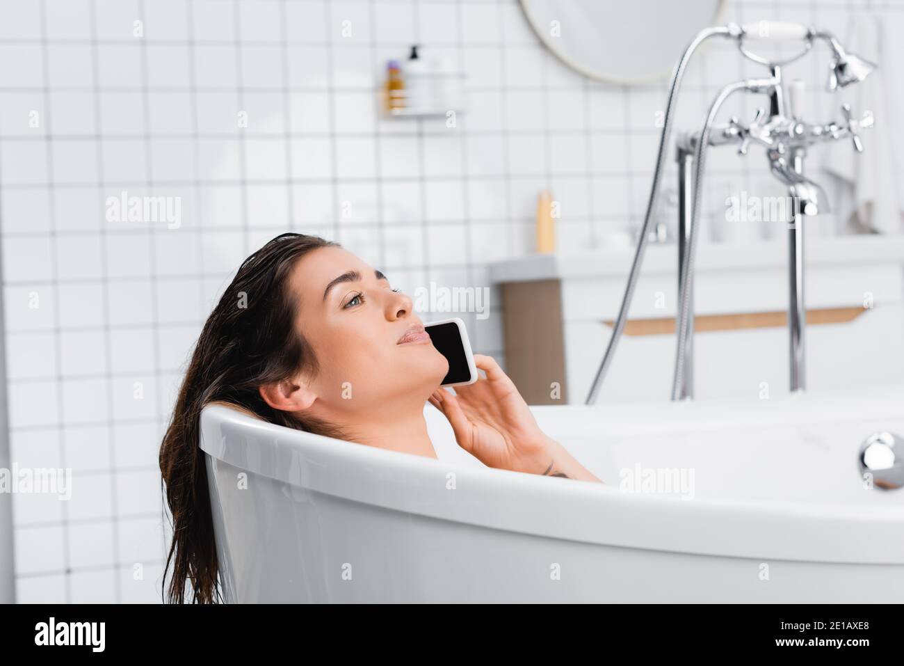 Woman taking bath hi-res stock photography and images - Alamy