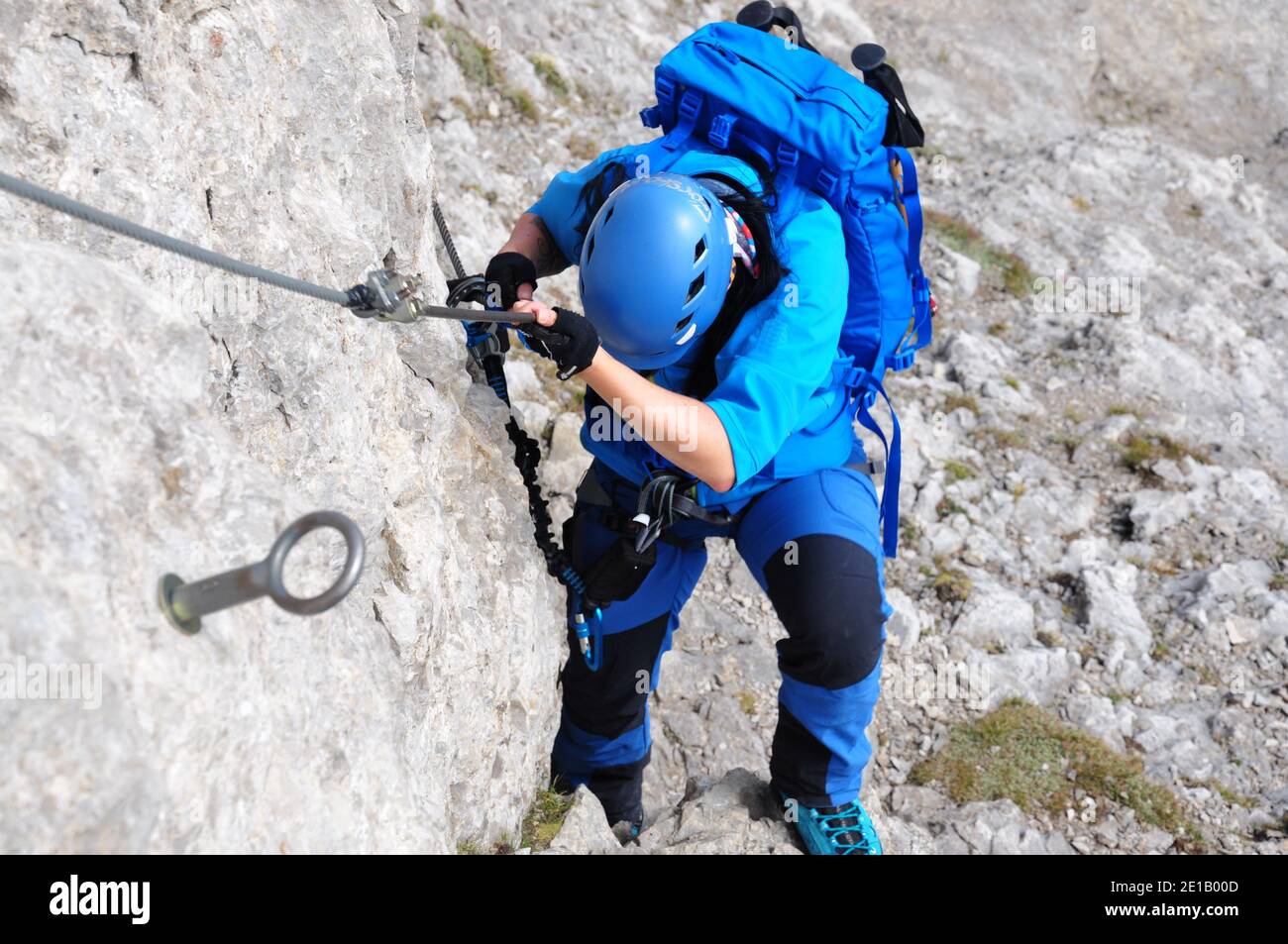 Girl is climbing on via ferrata, Dolomity Stock Photo - Alamy
