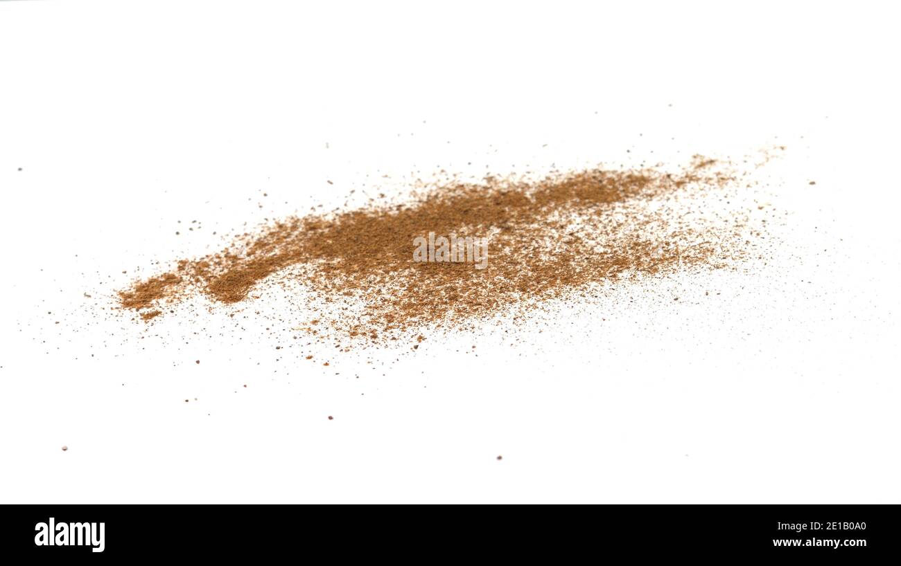 cinnamon powder isolated on a white background Stock Photo - Alamy