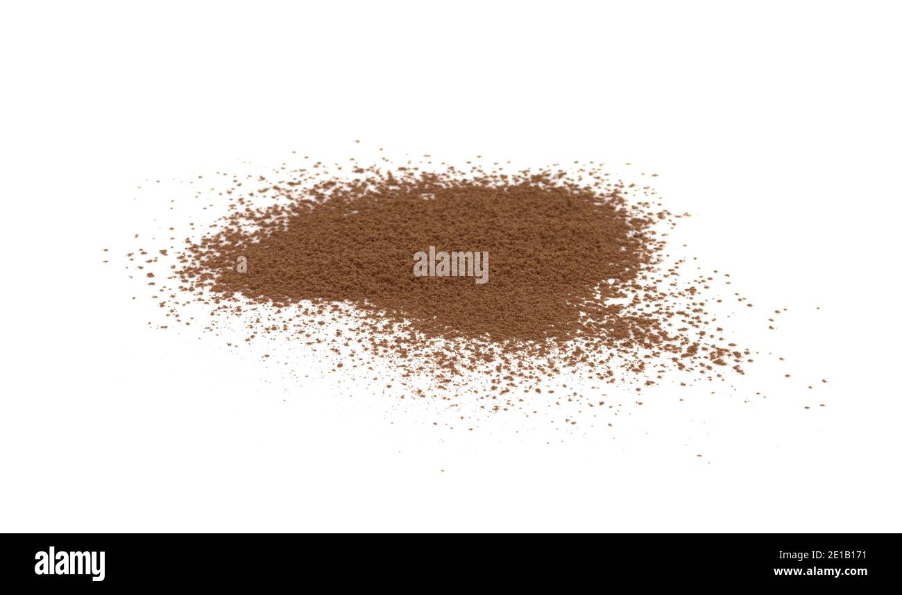 Pile cocoa powder isolated on white background Stock Photo - Alamy