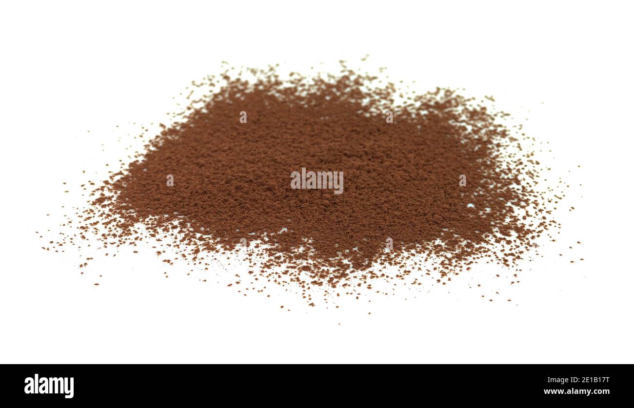 Pile cocoa powder isolated on white background Stock Photo - Alamy