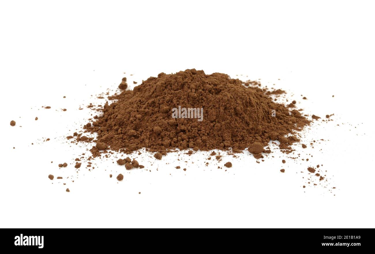 Pile cocoa powder isolated on white background Stock Photo - Alamy