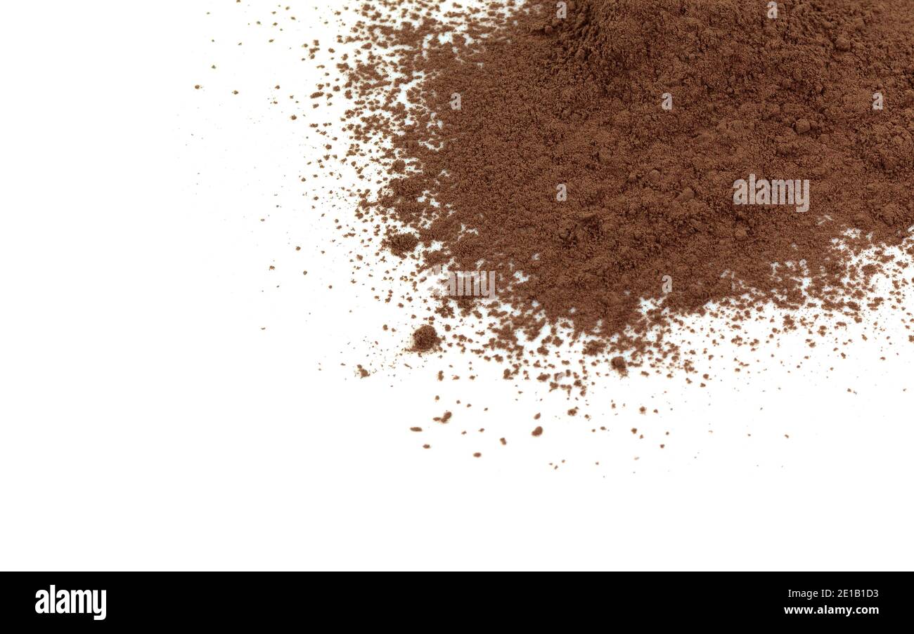 Pile cocoa powder isolated on white background Stock Photo - Alamy