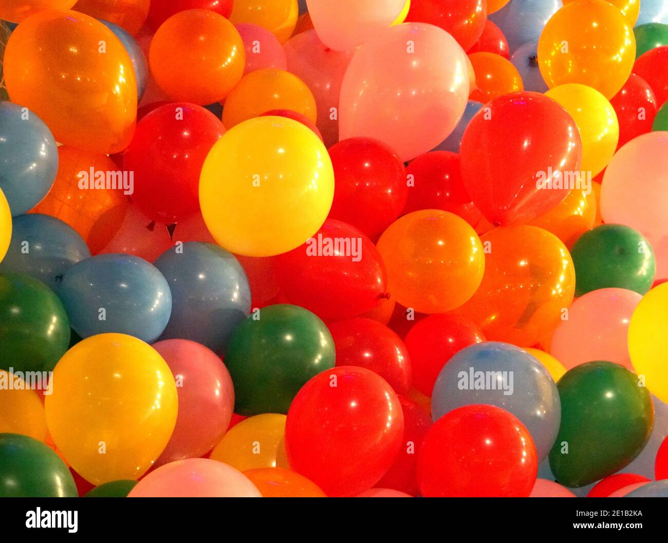 Family with color balloons hi-res stock photography and images - Alamy