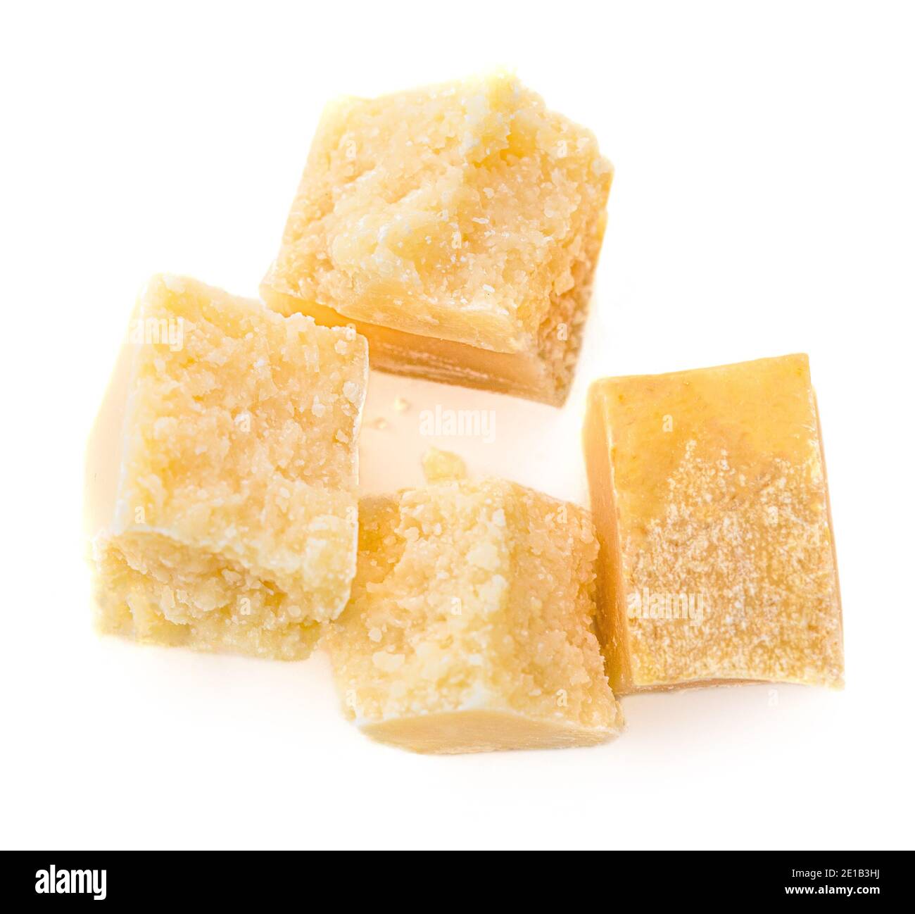 Pieces of Parmesan cheese isolated on white background. Yellow cheese ...