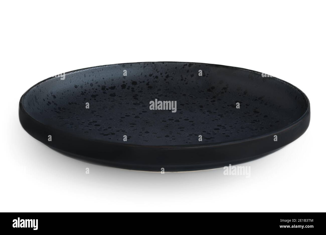 Empty ceramic round plate isolated on a white background. Side view ...