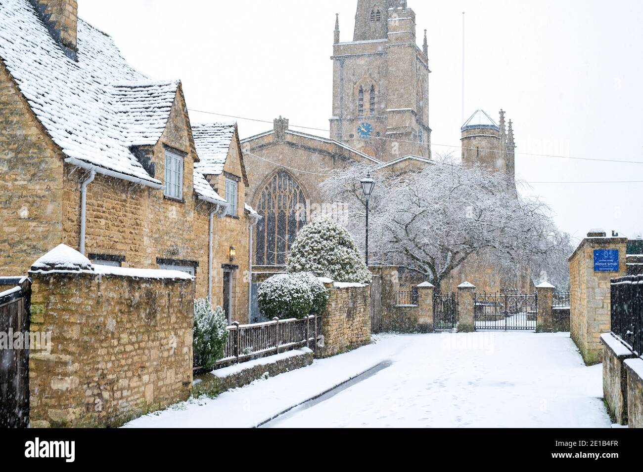 St John the Baptist church in the December Snow. Burford, Cotswolds ...