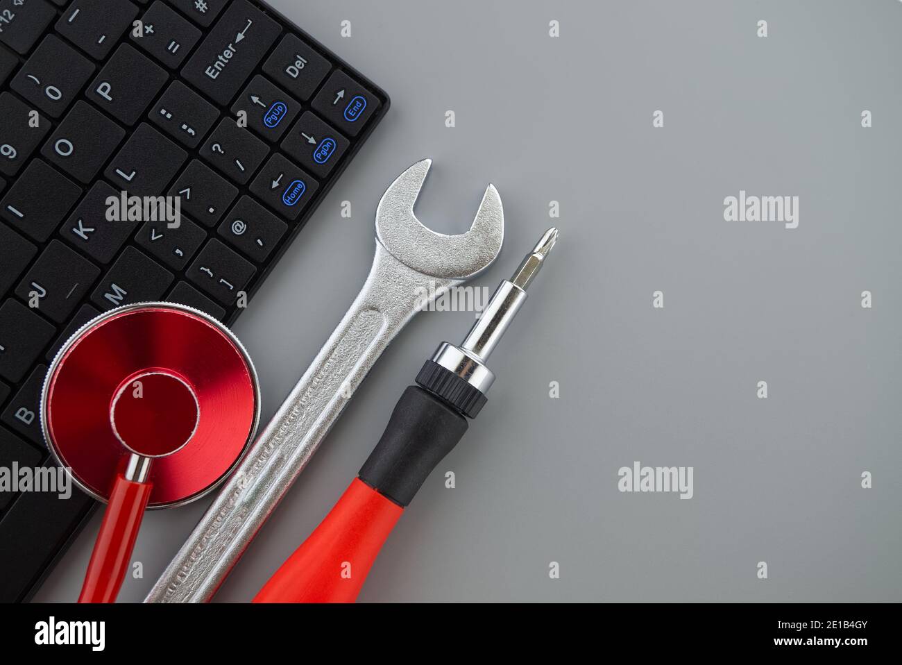 Computer repair or maintenance concept with a stethoscope to check the ...