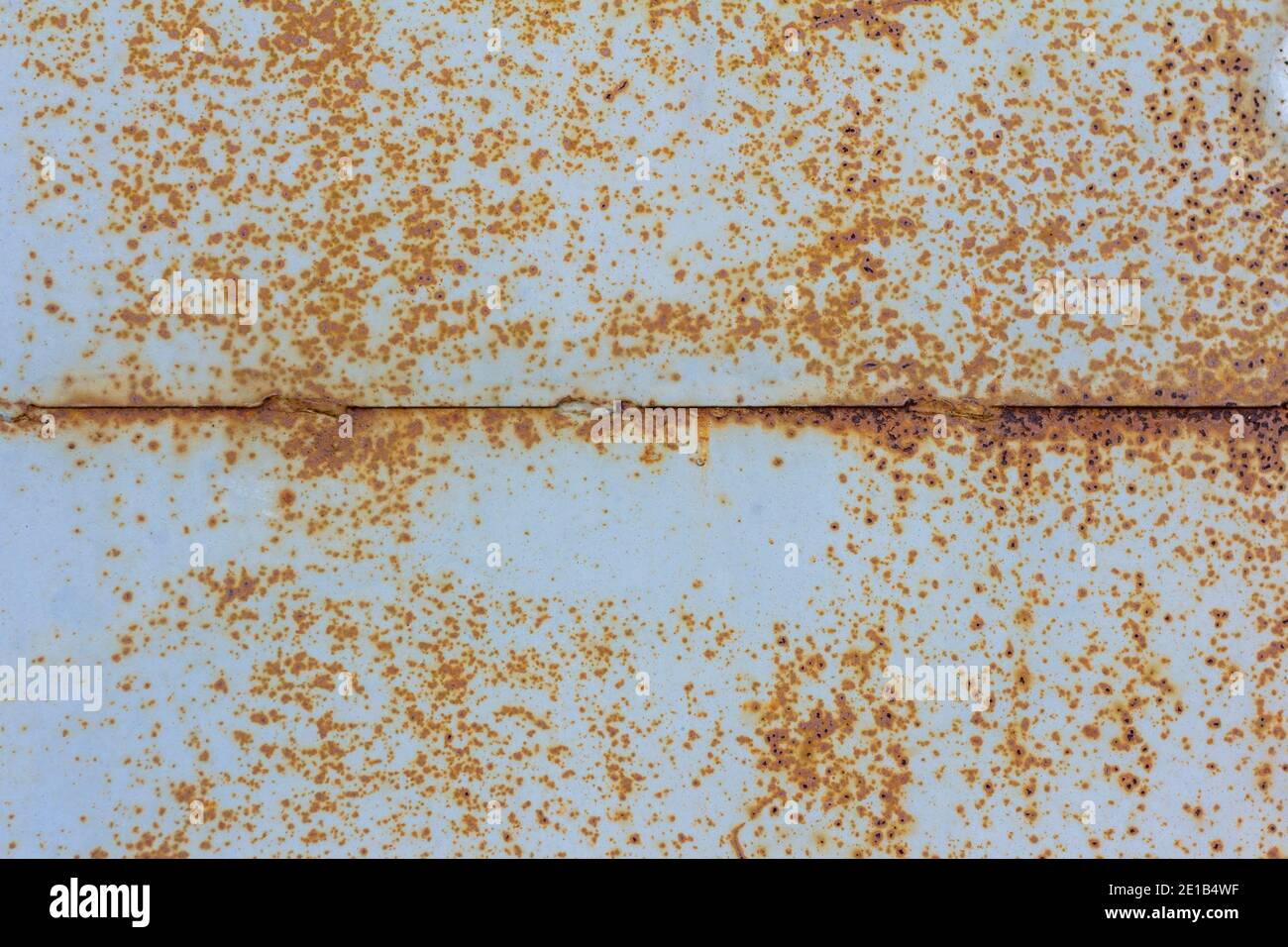 Light blue corroded metal background. Rusty and scratched painted metal ...