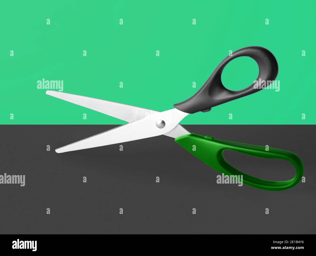 Scissors for paper on color background Stock Photo - Alamy