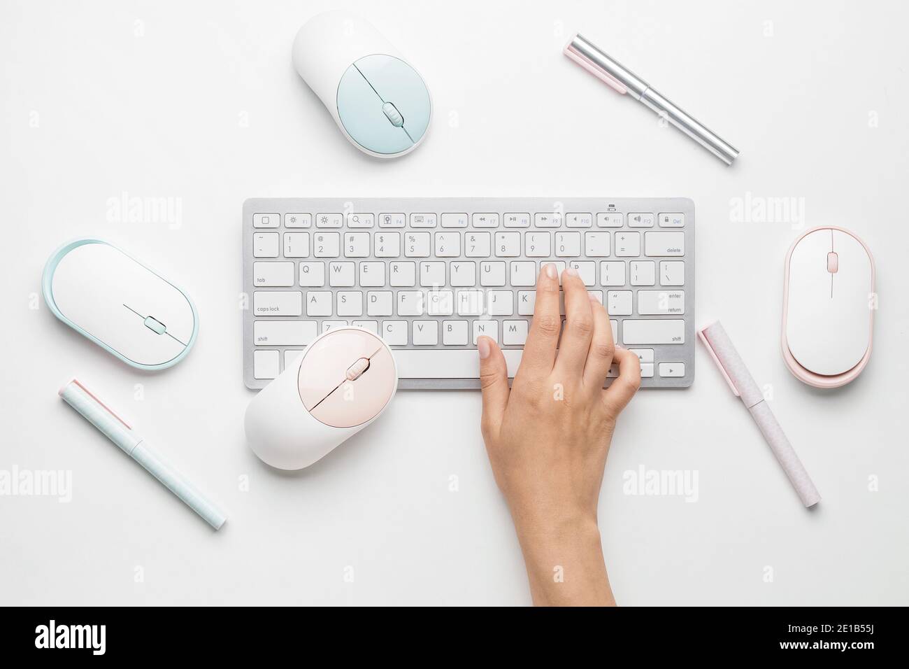 Female hand with computer keyboard and mouse on white background Stock ...