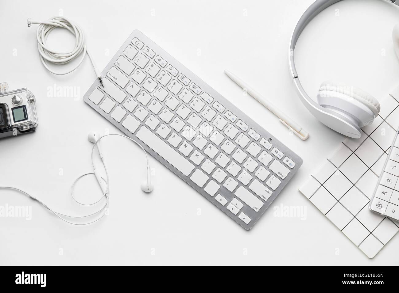 Computer keyboard and different modern devices isolated on white ...