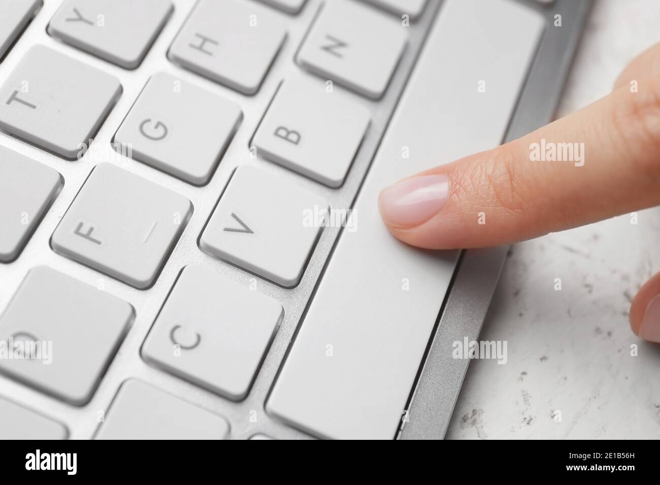 Female hand with computer keyboard, closeup Stock Photo - Alamy