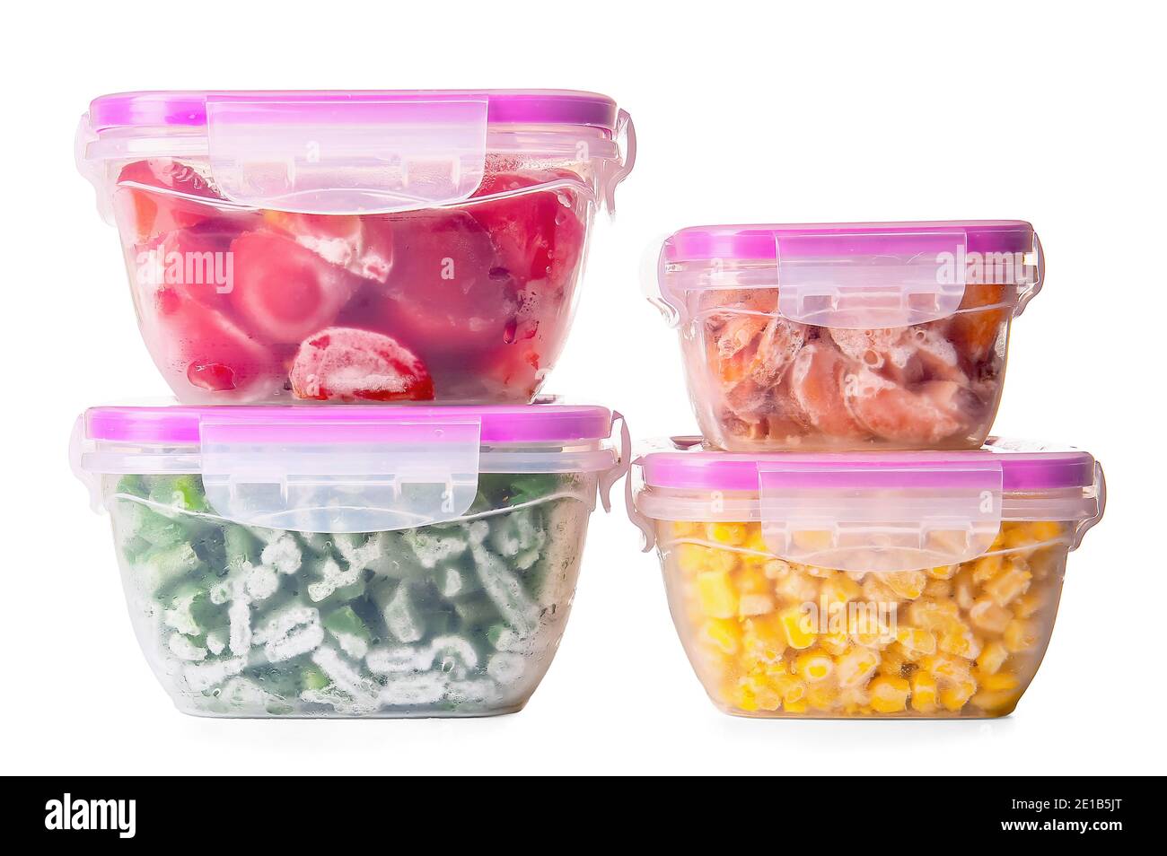 Frozen vegetables in plastic containers on white background Stock Photo ...
