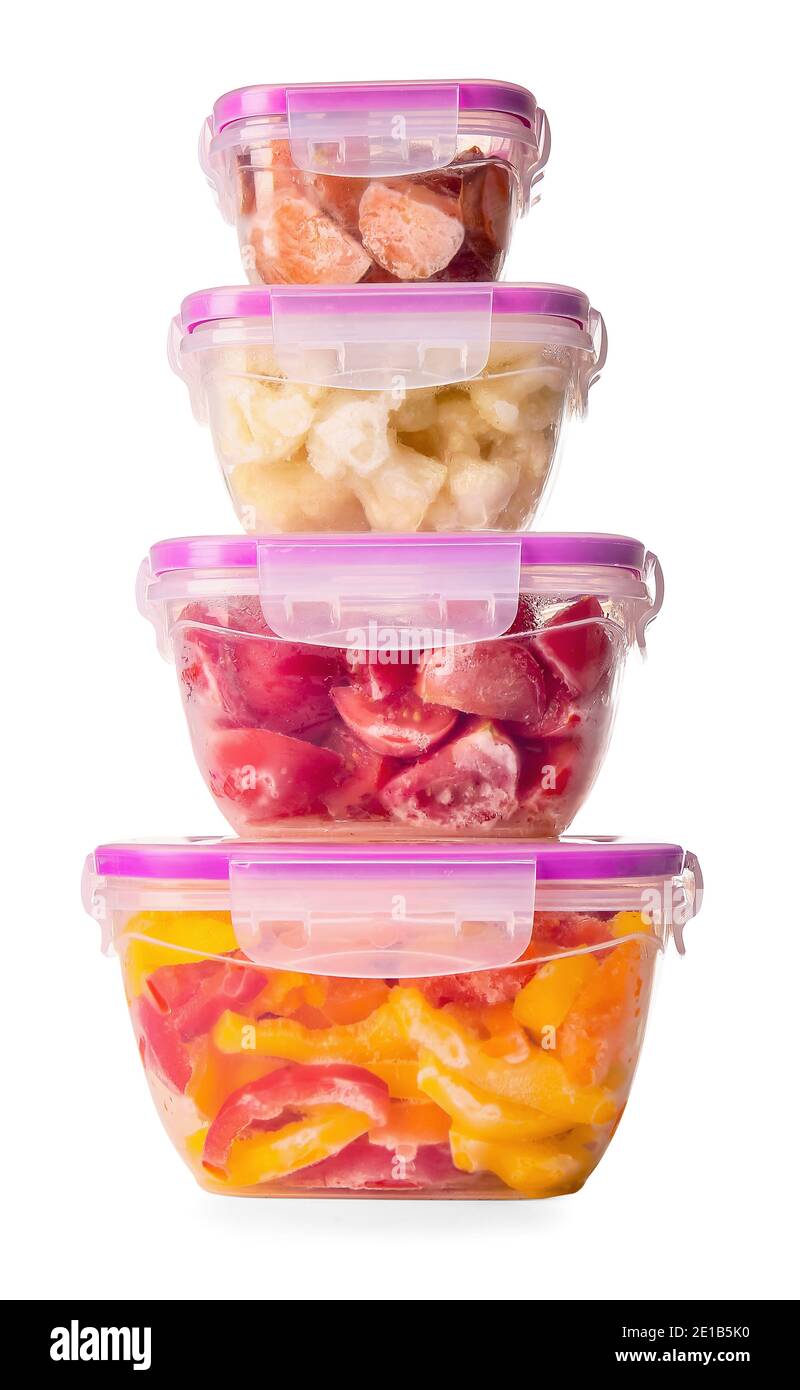 Frozen vegetables in plastic containers on white background Stock Photo ...
